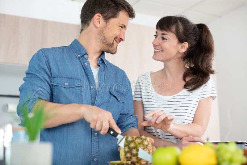 Happy Young Couple Cooking Together at Home Stock Image - Image of ...