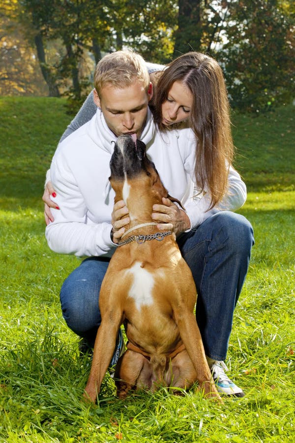 Happy Young Couple with Dog Stock Image - Image of face, romantic: 36308485