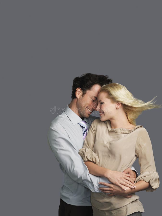 Young man embraces woman stock image. Image of leisure - 21970817