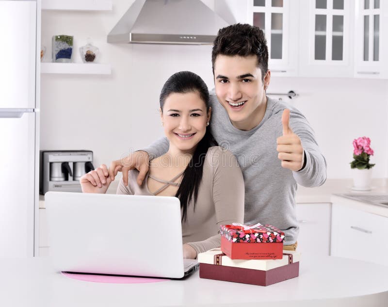 Happy Young Couple with Gift Boxes Stock Image - Image of computer ...