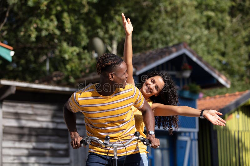 Happy Young Couple Going for Bike Ride Stock Photo - Image of happiness ...