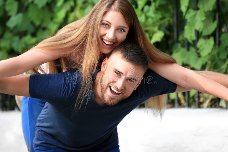 Happy Young Couple Having Fun Outdoors Stock Image - Image of affection ...