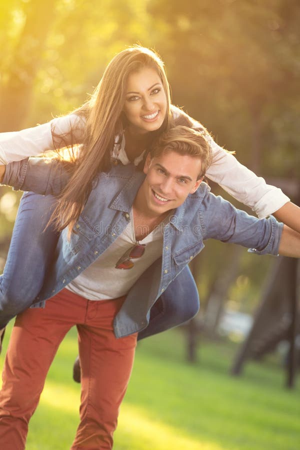 Young Couple Having Fun on the Beach Stock Image - Image of happy ...