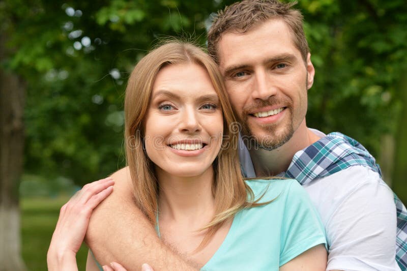 Happy young couple hugging stock image. Image of pretty - 99191937 Happy young couple hugging stock image. Image of pretty - 99191937