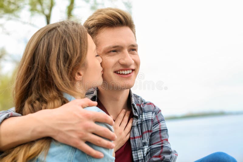 Happy Young Couple Near River on Spring Day Stock Photo - Image of ...