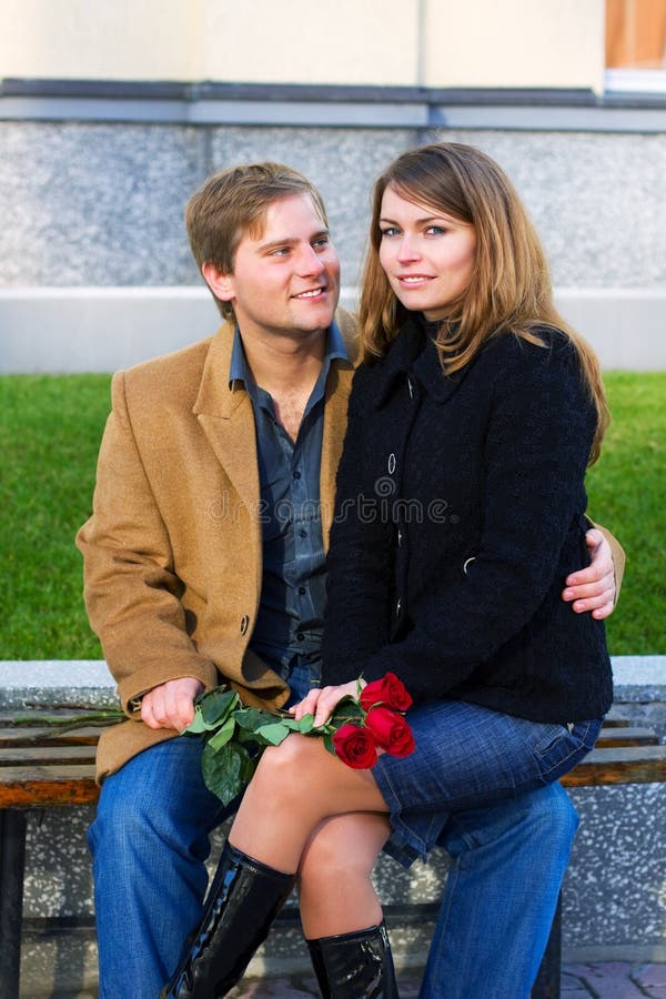 Happy Young Couple with a Red Roses. Stock Image - Image of girl ...