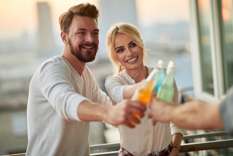 Happy Young Couple Socializing Together Stock Image - Image of ...
