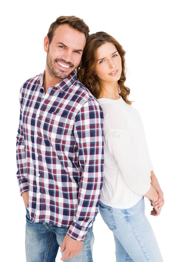 Happy Young Couple Standing Back To Back Stock Photo - Image of female ...