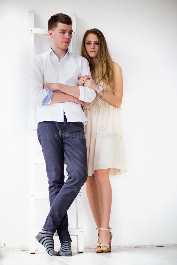 Happy Young Couple Standing Together Stock Image - Image of girl, hand ...