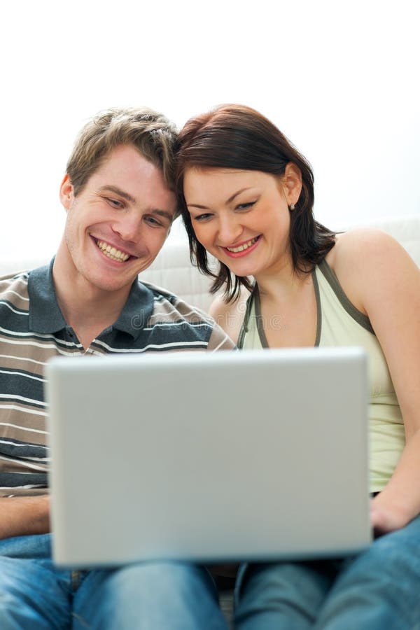 Happy Young Couple Surfing Internet Stock Photo - Image of surf, laptop ...