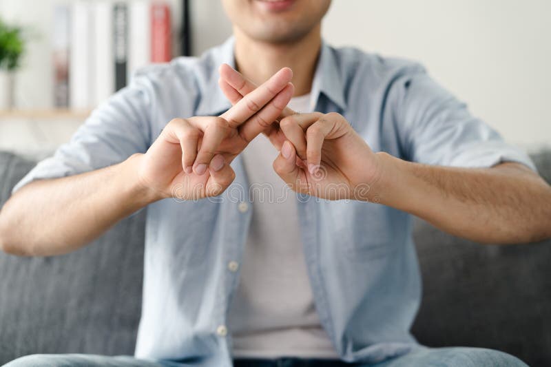 Happy Young Deaf Man Using Sign Language To Communicate with Other ...