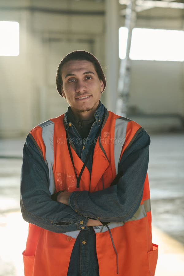 Happy Young Engineer or Foreman in Protective Fluorescent Vest Stock ...