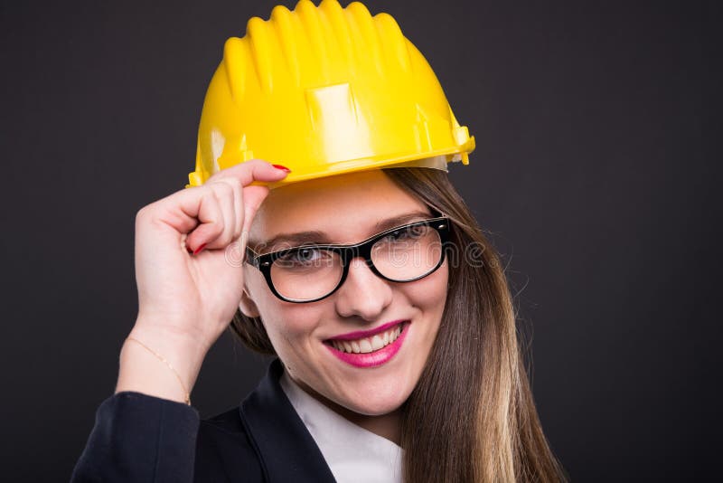 Happy Young Engineer Woman with Yellow Helmet Stock Photo - Image of ...