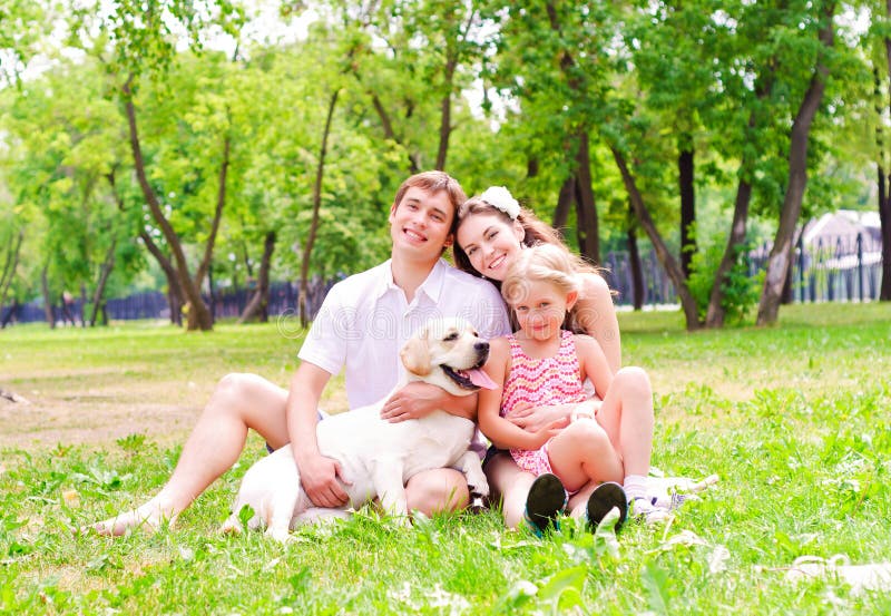 Happy Young Family with Labrador Stock Image - Image of healthy, child ...