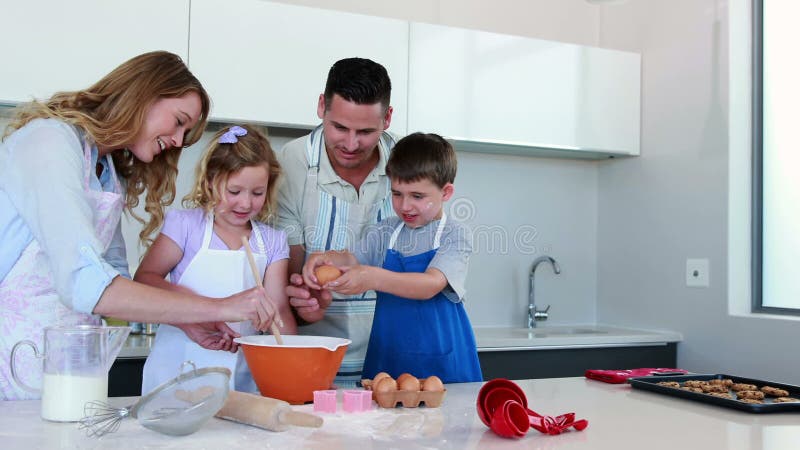 Young Family At Home Preparing Food Stock Footage - Video of healthy ...
