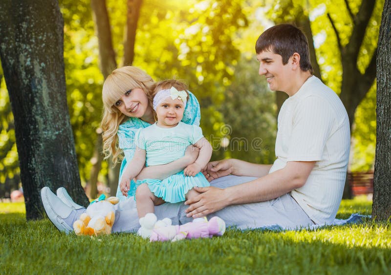 Happy Young Family Spending Time on a Summer Day Stock Photo - Image of ...