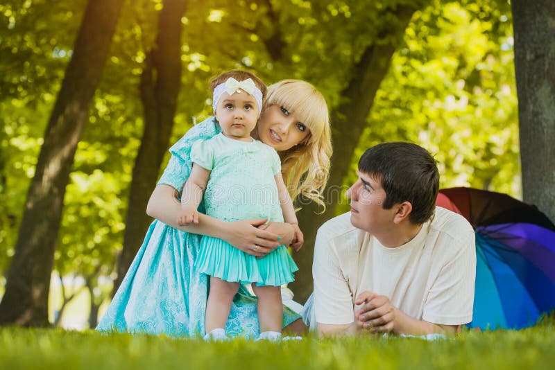 Happy Young Family Spending Time on a Summer Day Stock Image - Image of ...