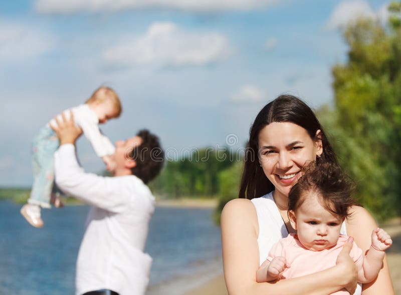 Happy Young Family with Two Children Stock Image - Image of beautiful ...