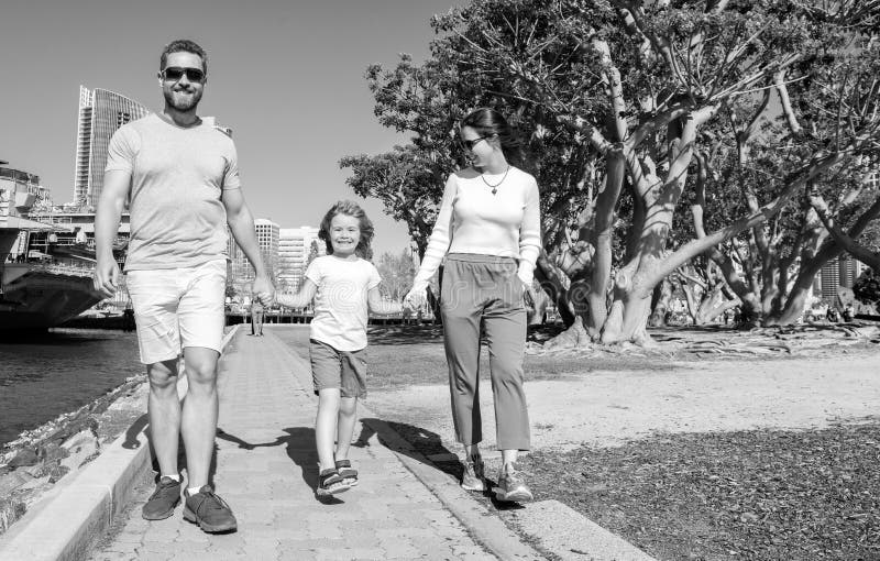 Happy Young Family Walking in Park with Son, Family Stock Image - Image ...