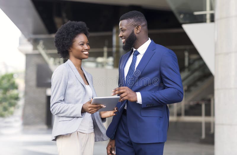 Fellow Workers are Looking in Laptop and Smiling Stock Image - Image of ...