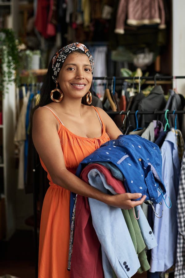 Happy Young Female Shop Assistant Stock Photo - Image of apparel ...