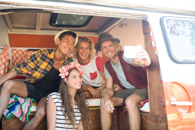 Happy Young Friends Taking Selfie in Camper Van Stock Image - Image of ...