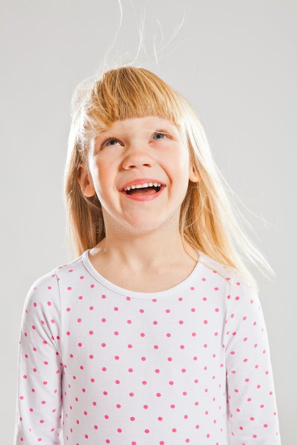 Happy Young Girl Looking Up Stock Image - Image of pretty, person: 28278139