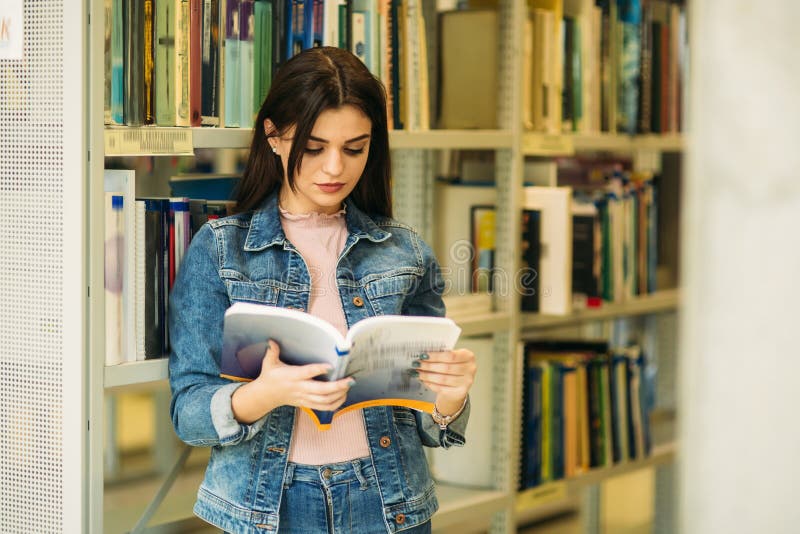 Happy Young Girl Student Studing in Library Stock Photo - Image of ...