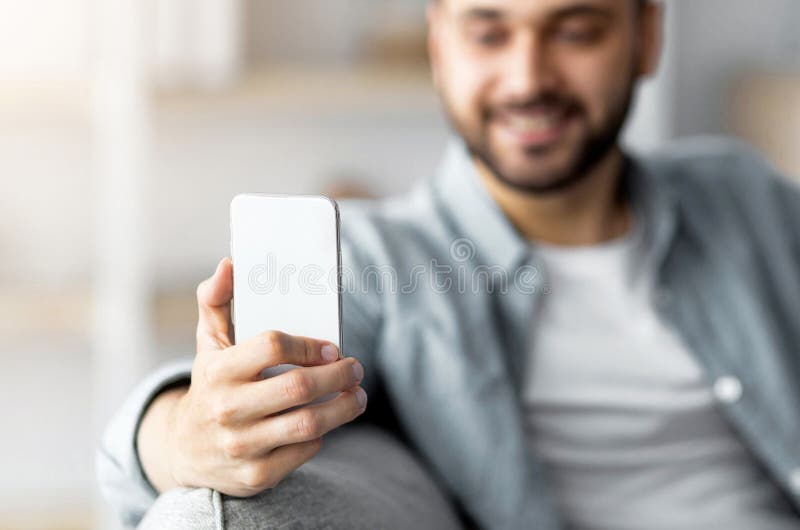 Happy Young Guy Holding Smartphone and Cup of Coffee, Sending Email ...