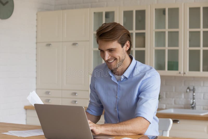 Happy Young Handsome Businessman Working on Computer at Home. Stock ...