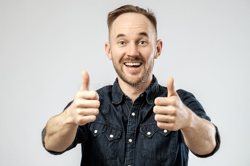 Happy Young Handsome Man Gesturing Stock Photo - Image of concept ...