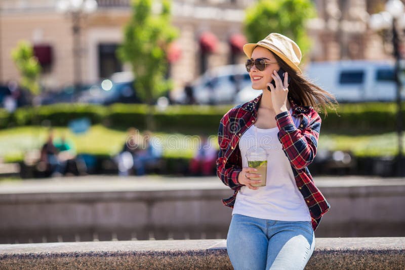 Happy Young Lady Talking on Mobile Phone Stock Photo - Image of ...