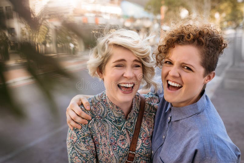 Laughing Lesbian Couple Having Fun Together At The Beach Stock Image Image Of Caring Love
