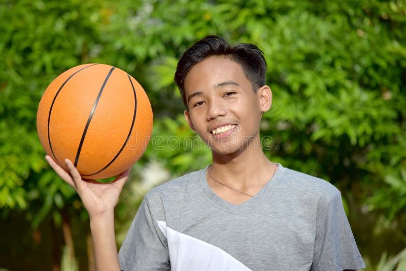 Happy Young Male Basketball Player with Basketball Stock Image - Image ...