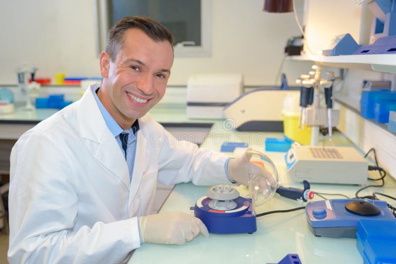 Happy Young Male Researcher Working in Lab Stock Photo - Image of ...