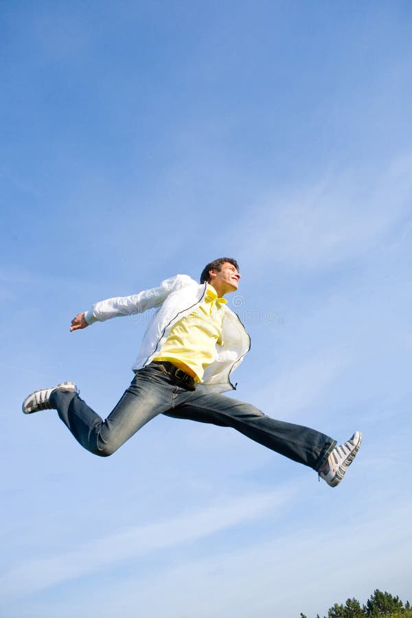 Attractive Young Male Model Jumping Outdoors Stock Photo - Image of ...