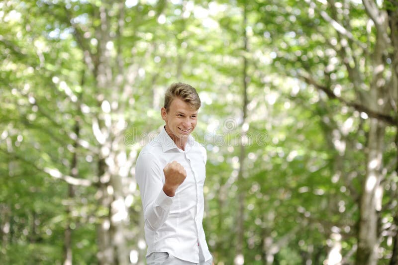 Happy Young Man Celebrating Success Stock Image - Image of success ...