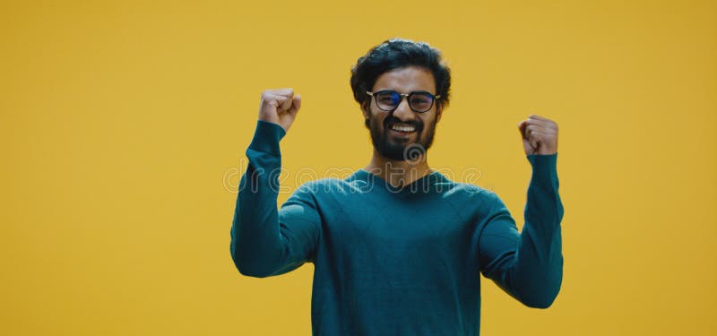 Happy young man cheering stock image. Image of success - 169537099