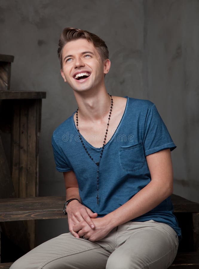 Happy young man Christian stock photo. Image of portrait - 34441074