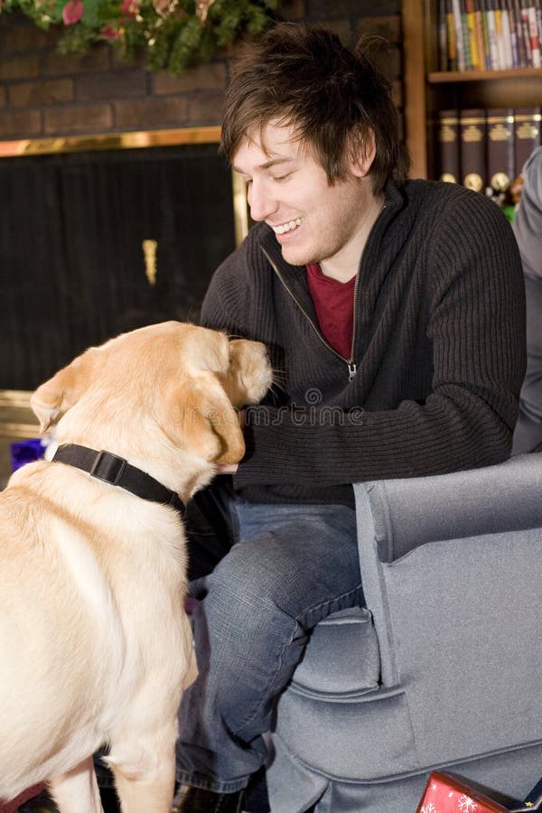 Happy Young Man with Dog stock photo. Image of family - 14252450
