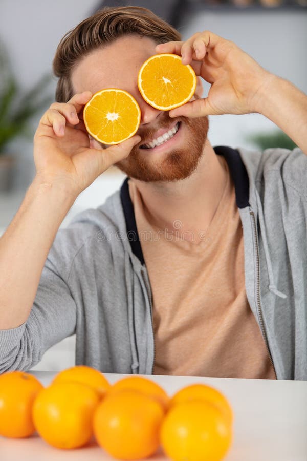 Happy Young Man Having Fun with Oranges Stock Photo - Image of muscle ...