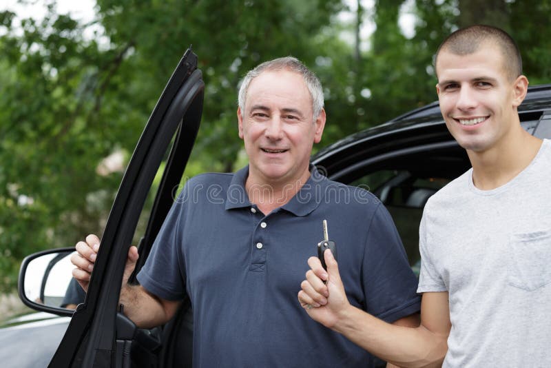 Happy Young Man Holding Car Keys Stock Photo - Image of accessibility ...
