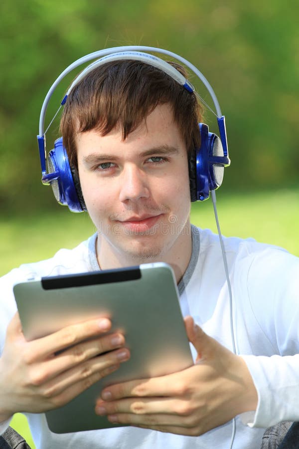 200 Happy Young Man Holding Ipad Stock Photos - Free & Royalty-Free ...