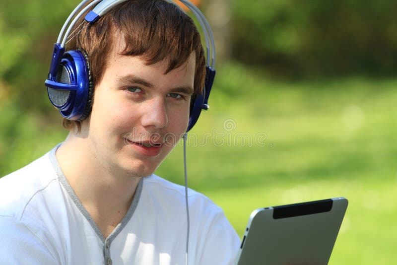 Happy Young Man Holding an Ipad Stock Image - Image of person, tablet ...
