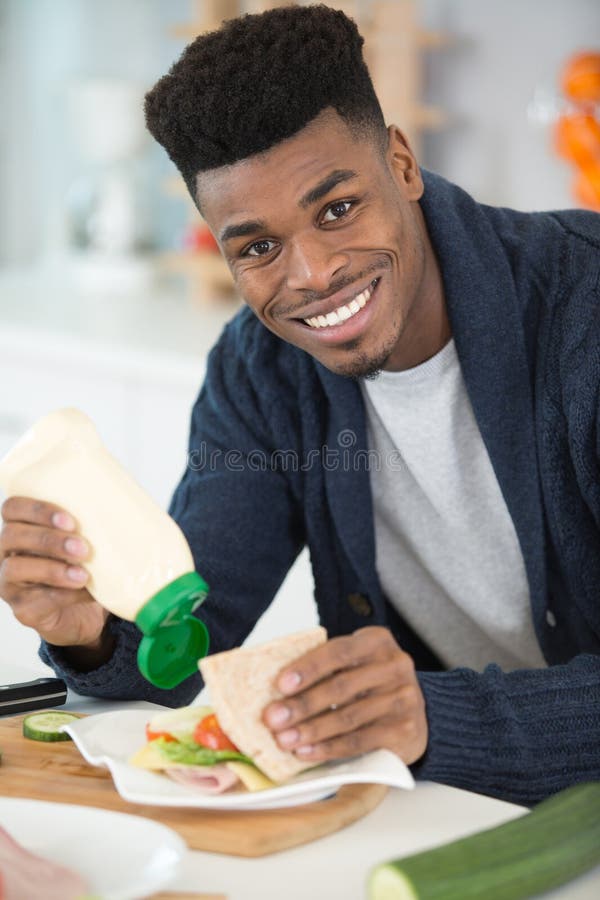 Happy Young Man Making Perfect Sandwich Stock Image - Image of meal ...