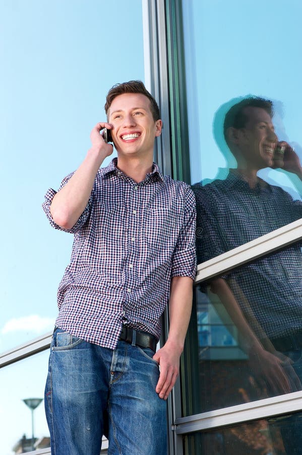 Happy Young Man on Mobile Phone Outdoors Stock Image - Image of call ...