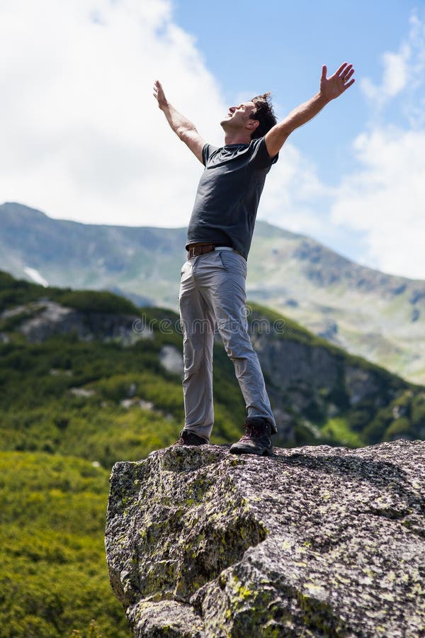 Happy Young Man in the Mountains Stock Photo - Image of happy, hiking ...
