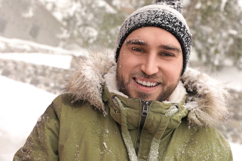 Happy Young Man Outdoors on Snowy Winter Day Stock Photo - Image of ...