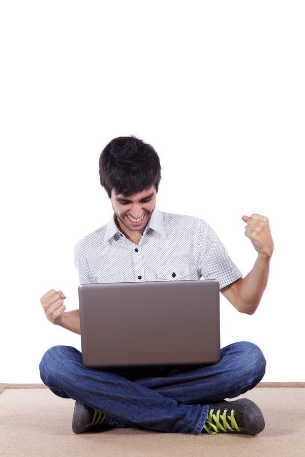 Happy Young Man Surfing the Internet Stock Image - Image of crossed ...