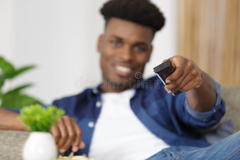 Happy Young Man with Tv Remote Control Stock Image - Image of channel ...